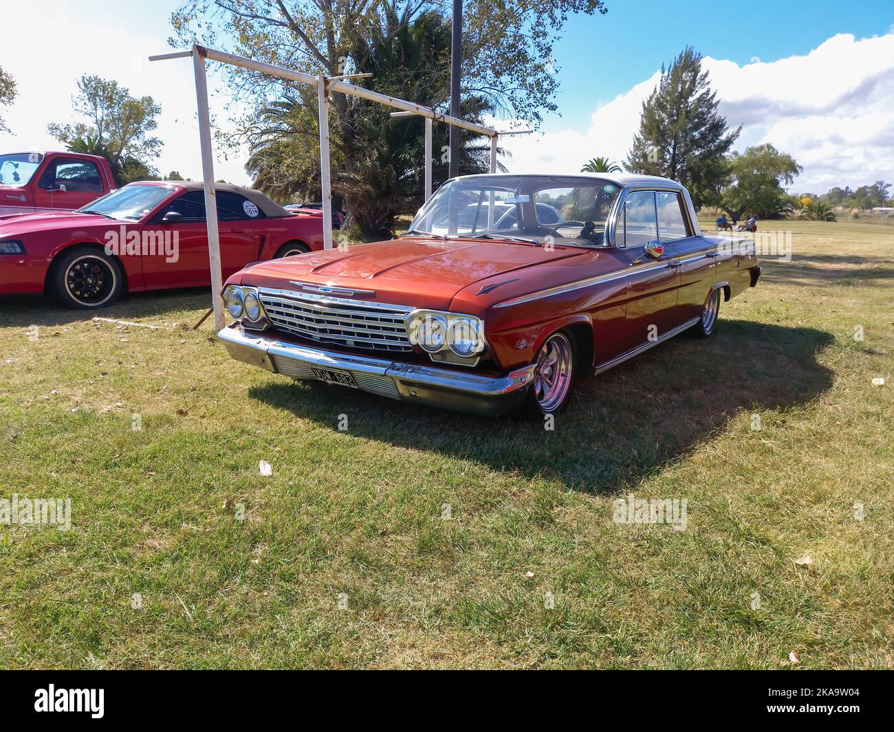 Old popular maroon Chevrolet Chevy Impala four door sedan 1960s by GM ...