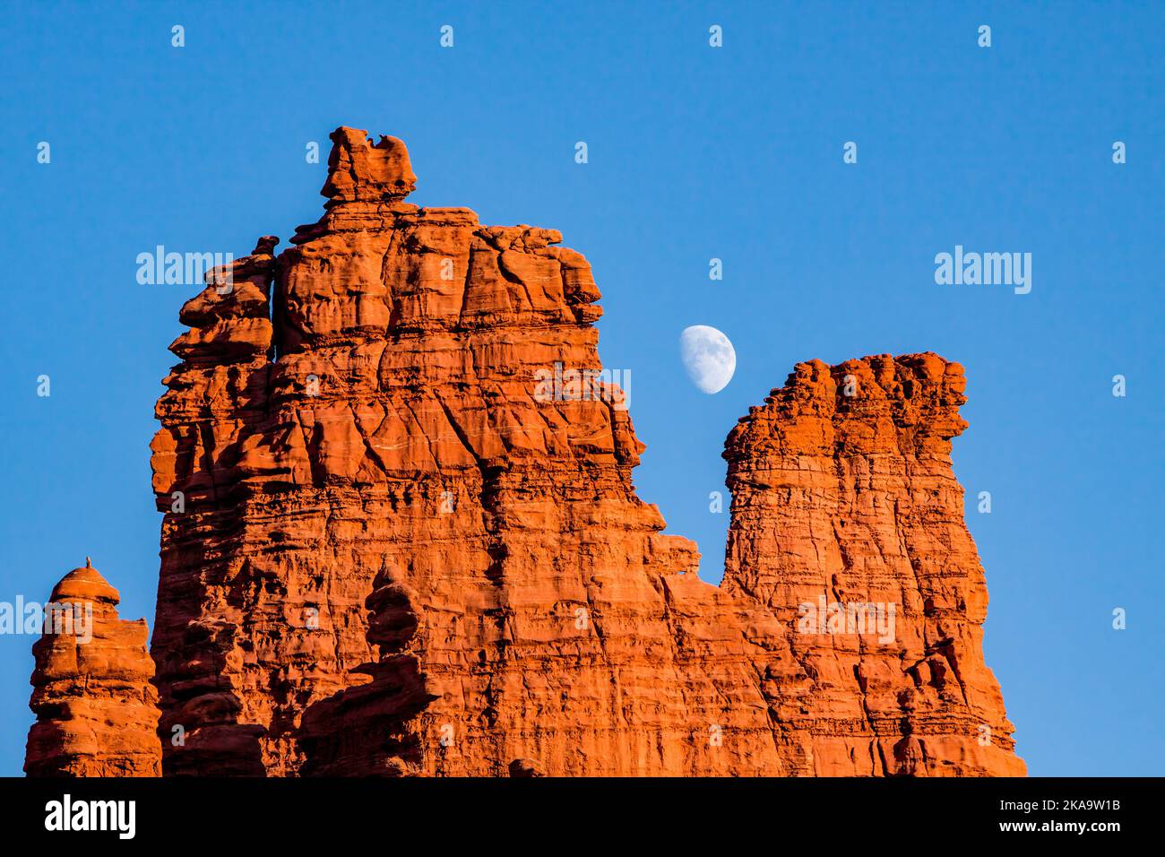 Rising moon between the Cottontail & the Titan in the Fisher Towers ...