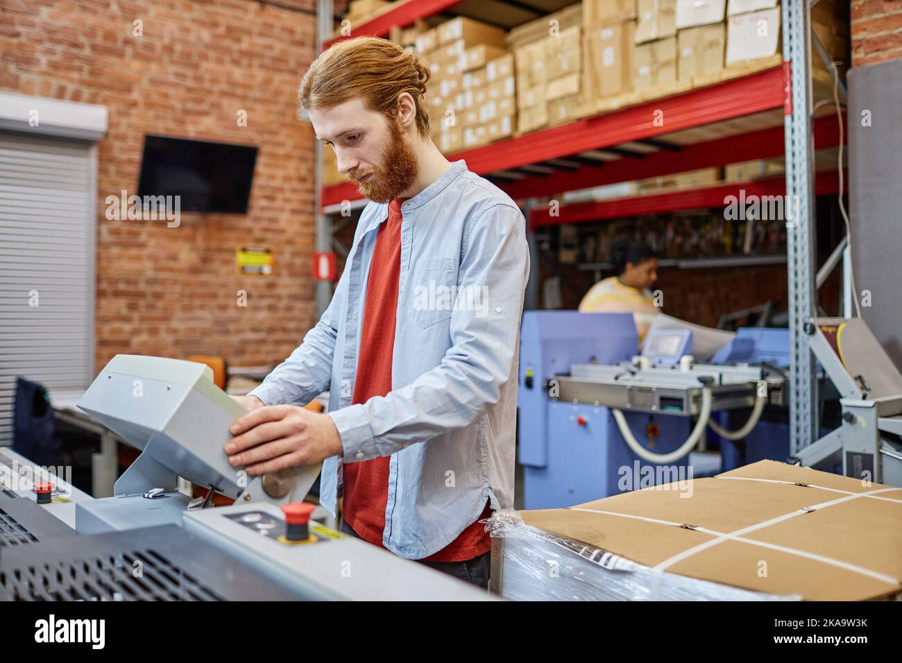 Setting up printing machine hi-res stock photography and images - Alamy