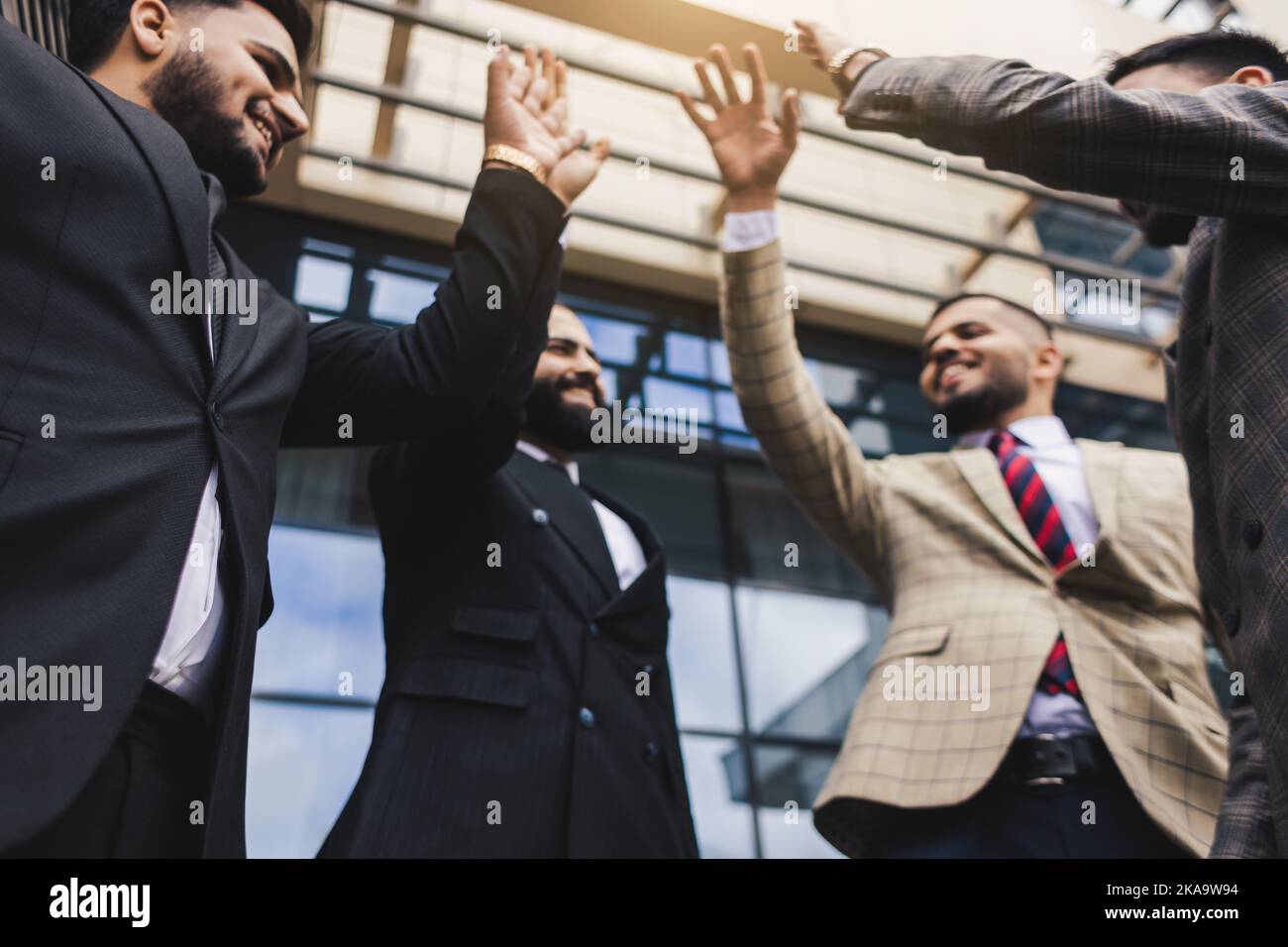 International business team of successful people celebrating victory ...