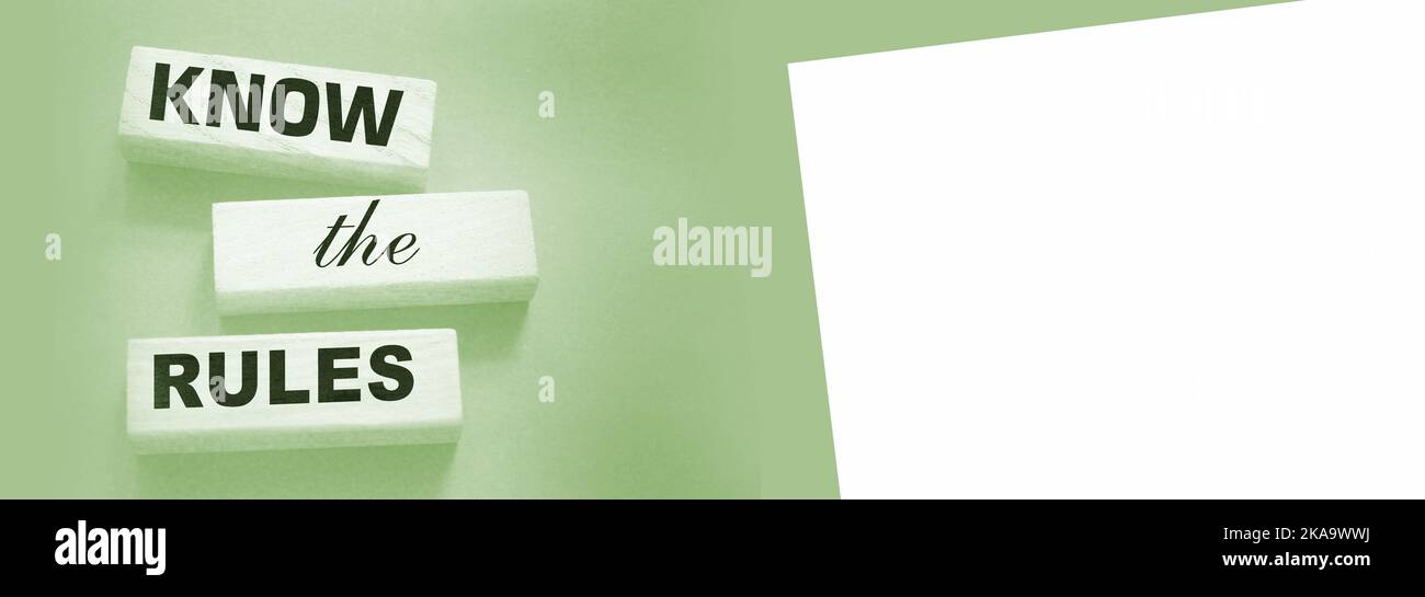 Know the rules word on wooden blocks isolated on dark grey background ...