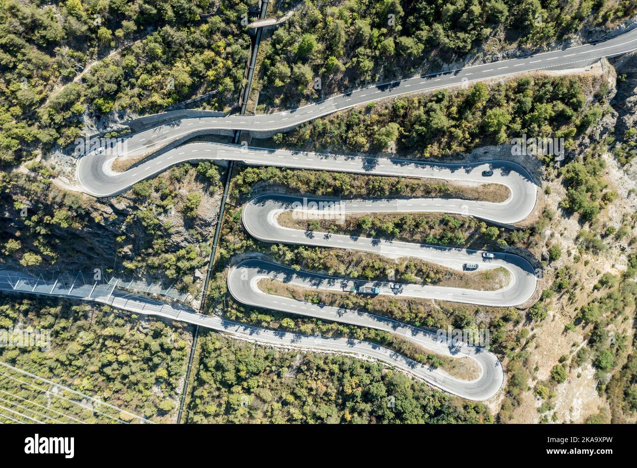 Amazing aerial view, drone shot, Mountain pass road with multiple ...