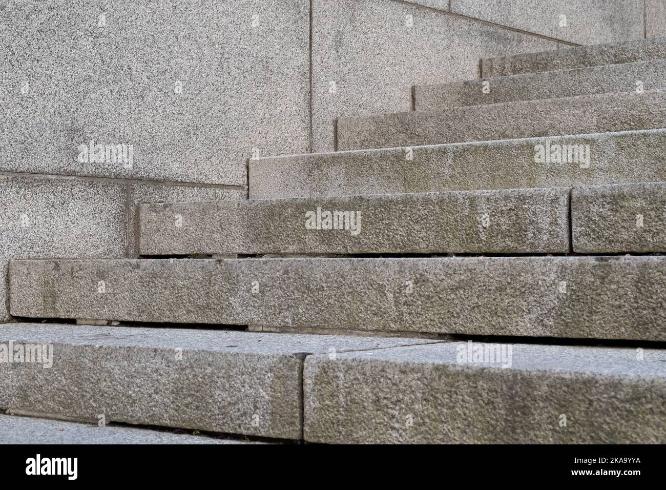 Architectural Close Up Detail Of Rugged Granite Steps And Wall Of