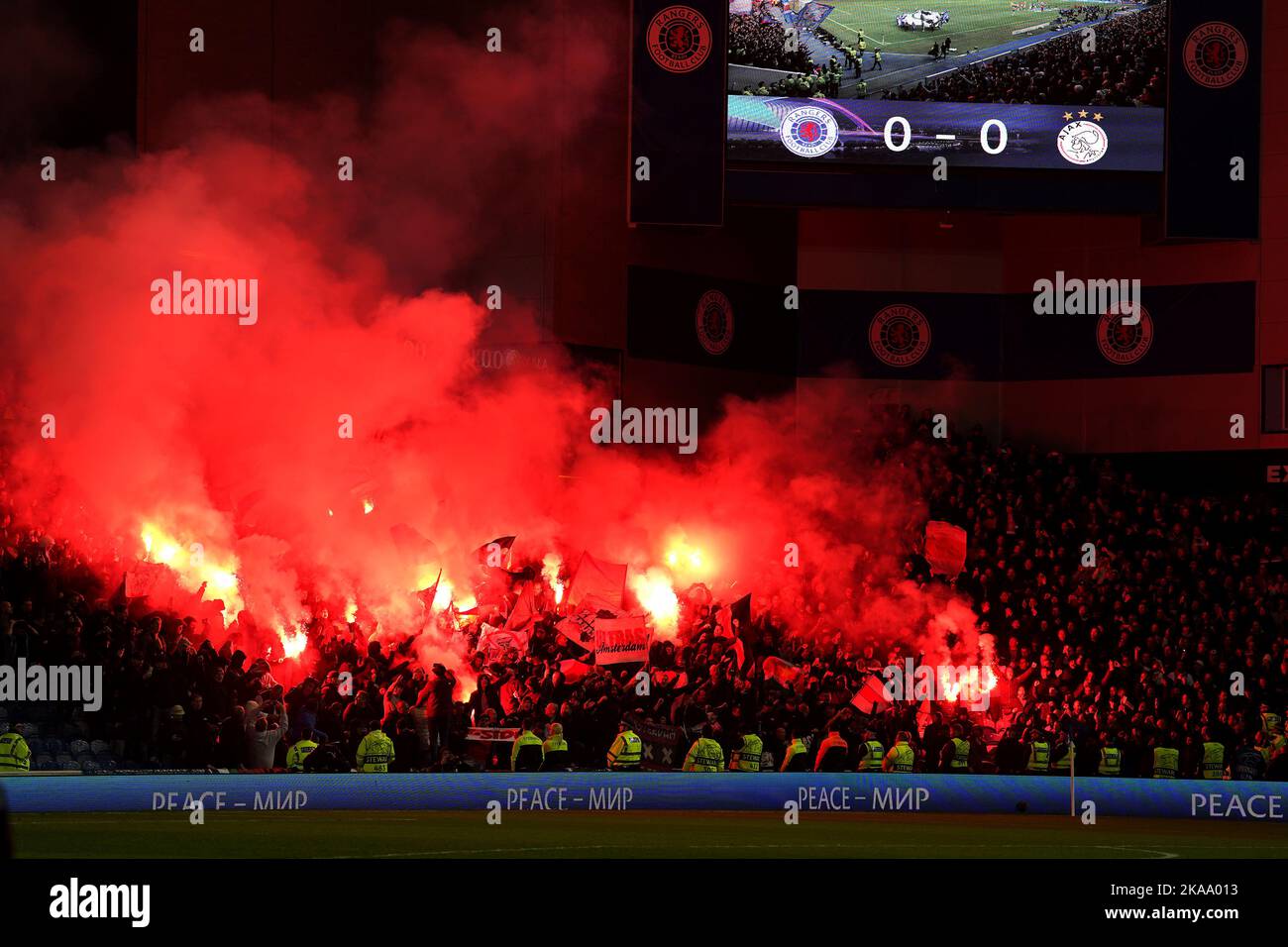 Ajax fans set off flares in the stands during the UEFA Champions League ...