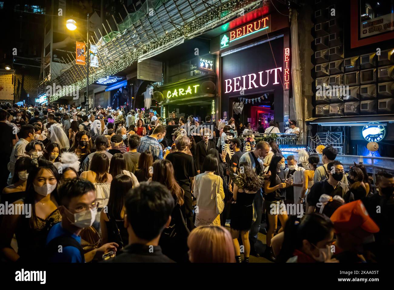 A Crowd of people flock in Lan Kwai Fong during the celebration ...