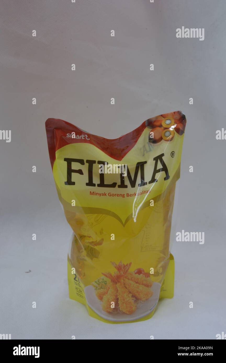 Filma packaged cooking oil on a white background Stock Photo - Alamy