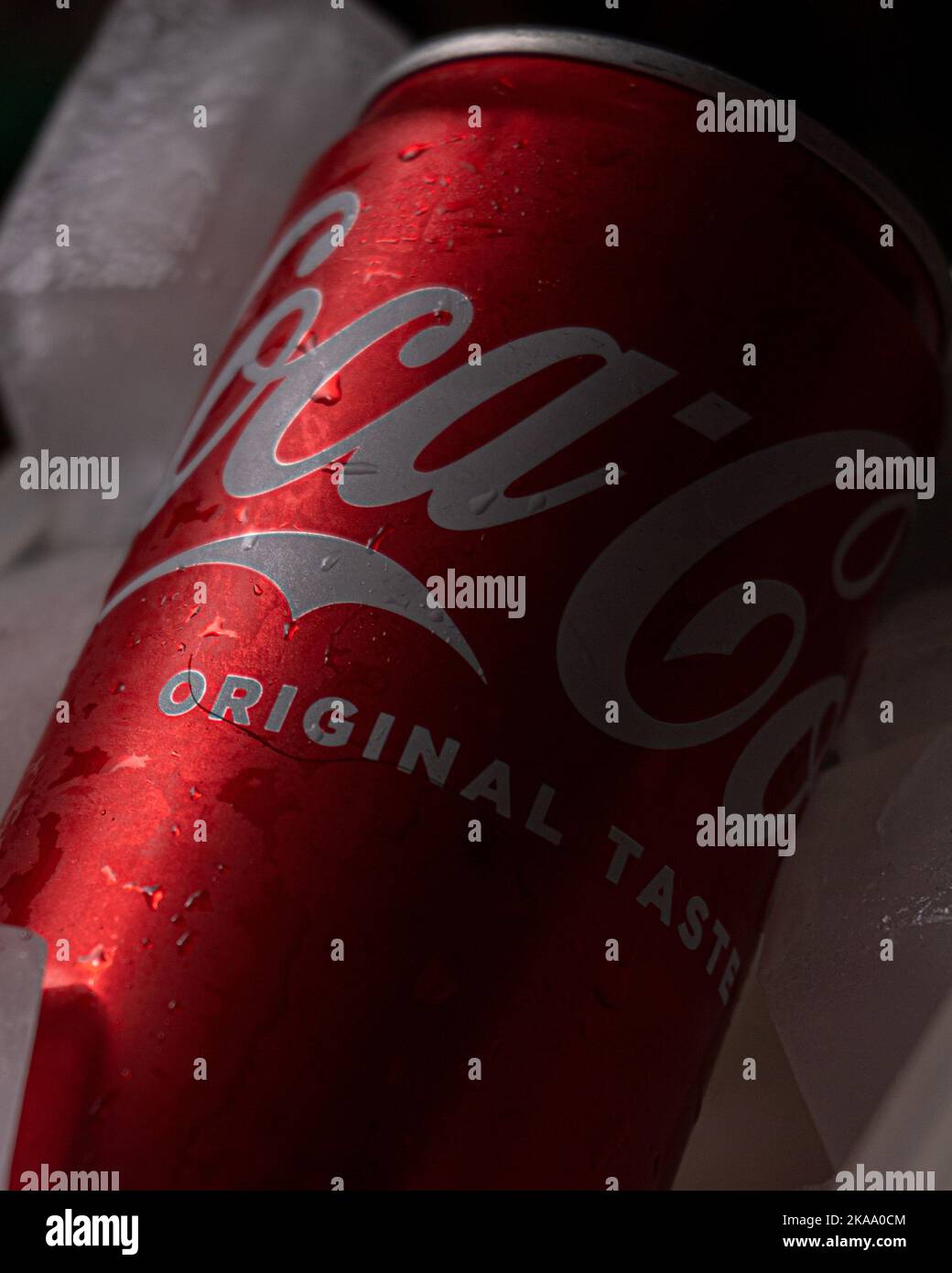 A closeup of Coca cola can under a light Stock Photo - Alamy