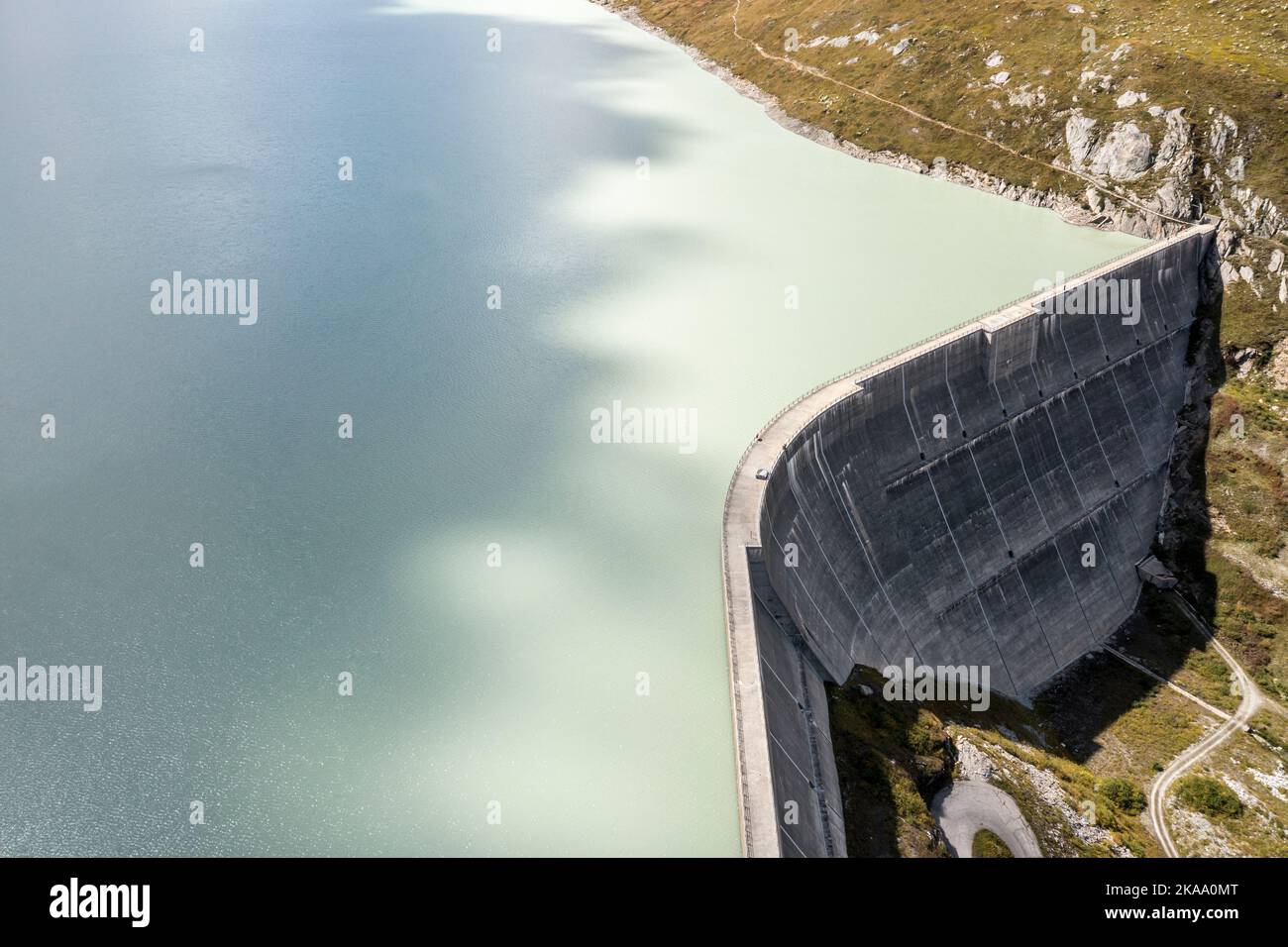Aerial view of Oberaar hydroelectric reservoir lake, dam, Oberhasli ...
