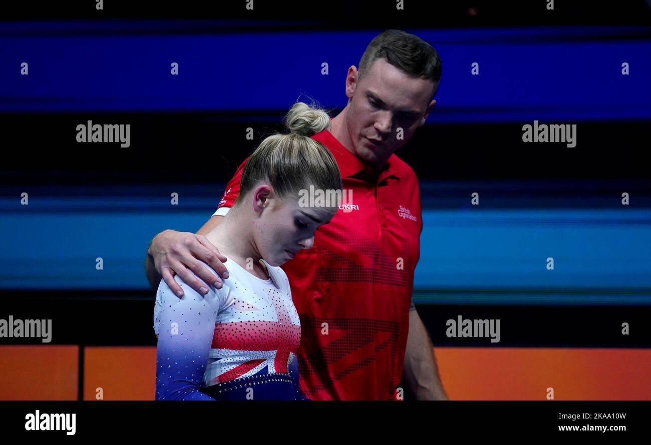 Great Britain's Alice Kinsella is consoled after falling from the ...