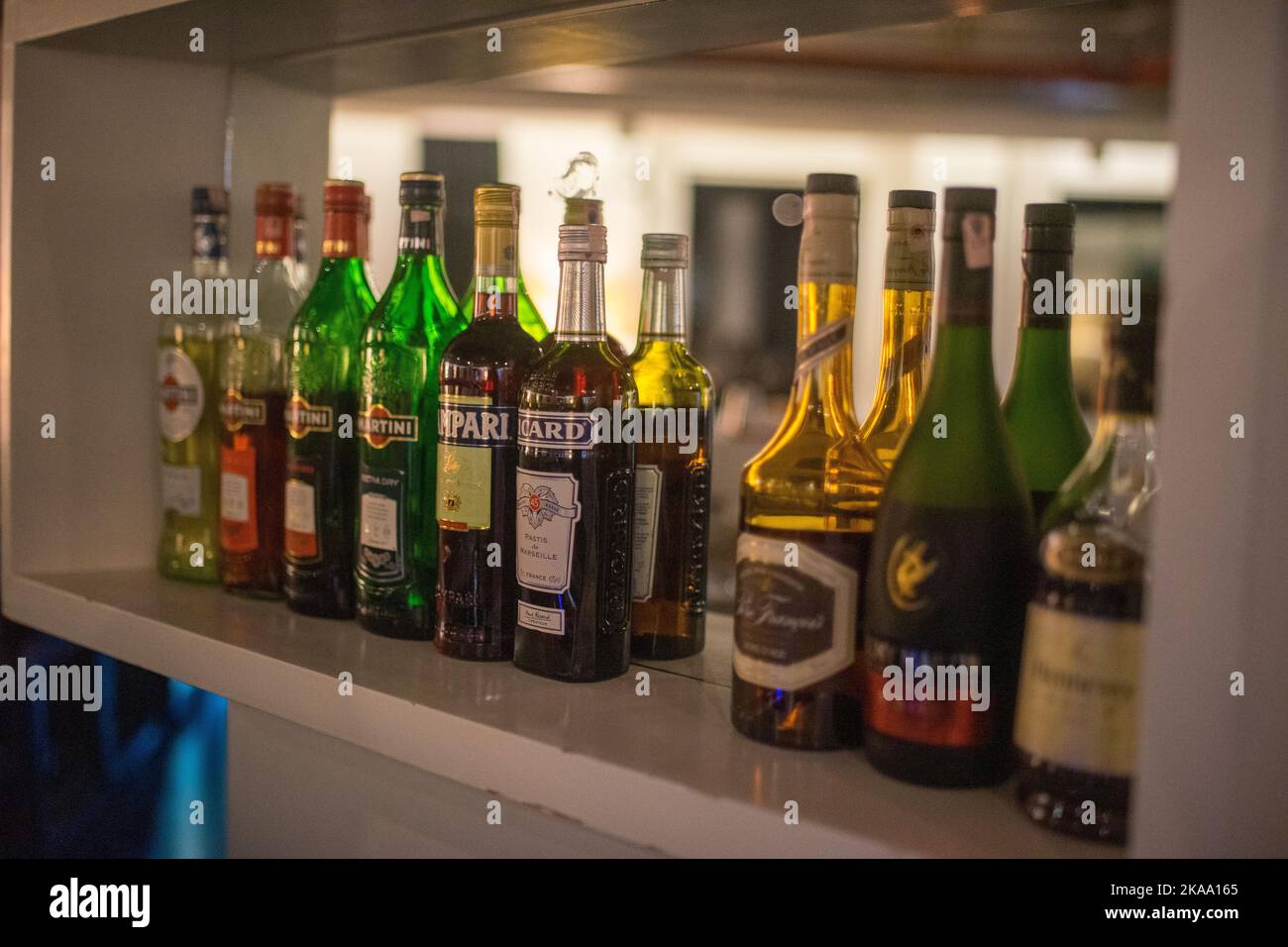 Different alcohol bottle on the shelf of a restaurant bar Stock Photo ...