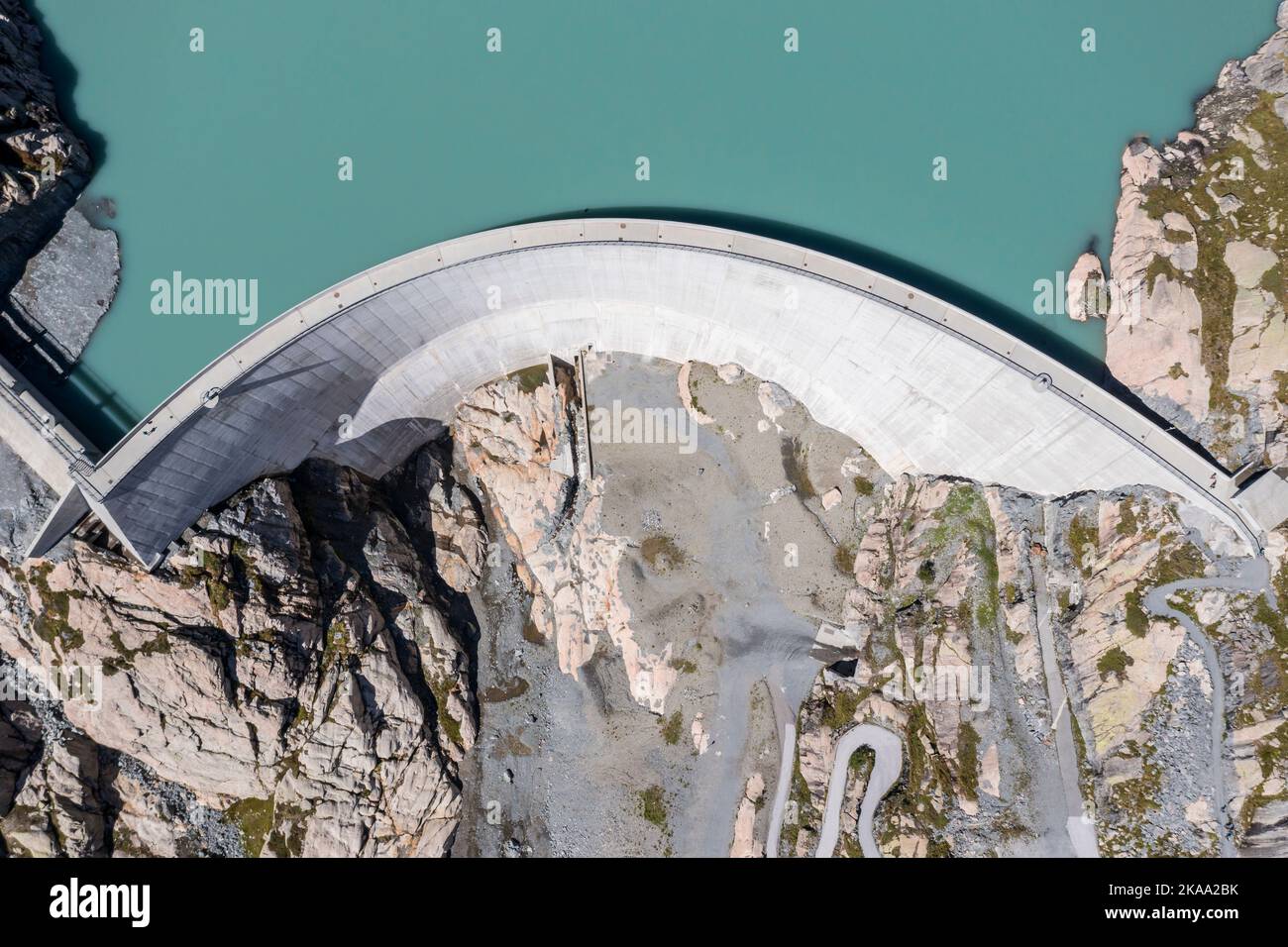 Amazing aerial view of reservoir dam Barrage du Vieux Emosson and ...