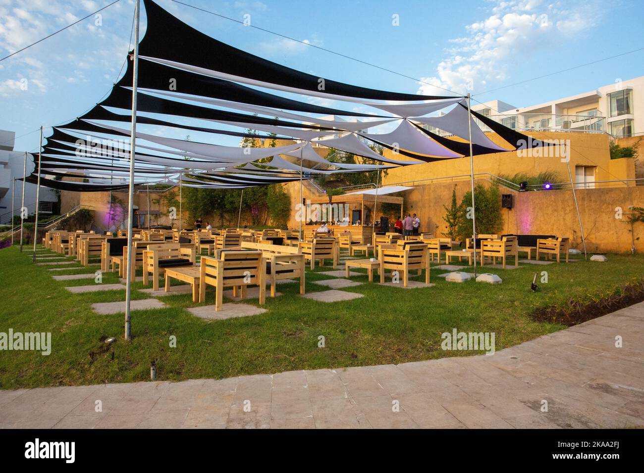 hotel patio terrace with wooden furniture Stock Photo - Alamy