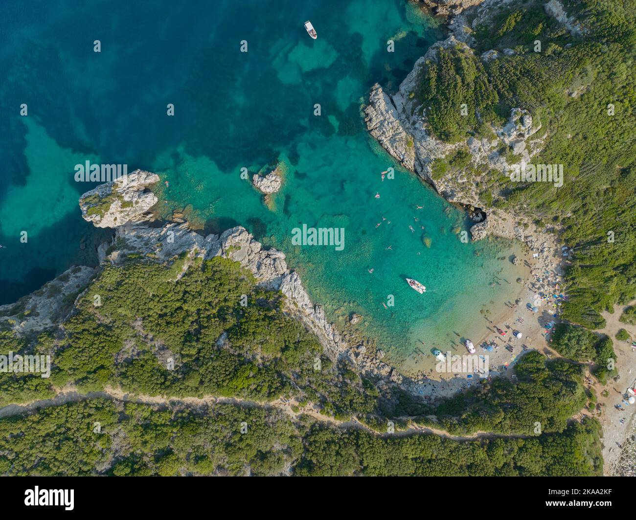 Aerial view of the coastline cliff that lead to Porto Timoni beach ...