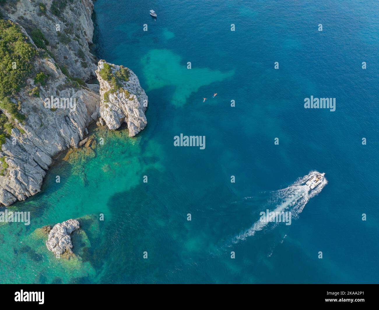 Aerial view of a boat moored near the coast of the island of Corfu ...