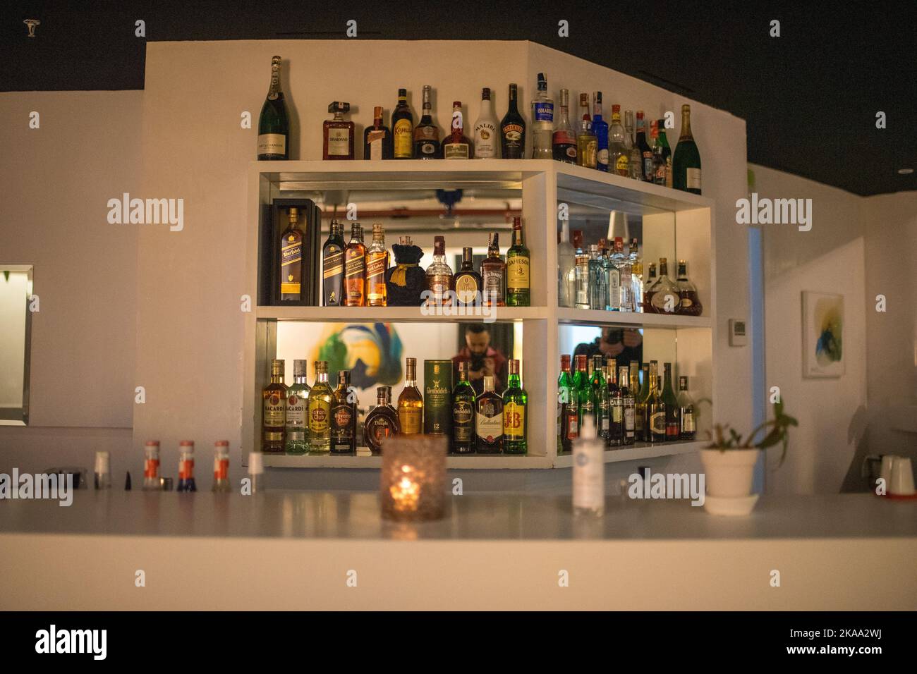 Different alcohol bottle on the shelf of a restaurant bar Stock Photo ...