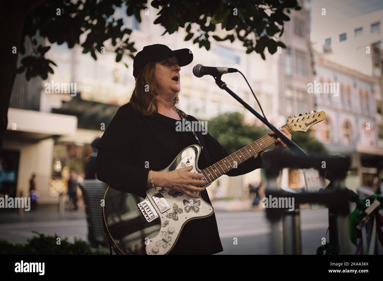 Female singing busker hi-res stock photography and images - Alamy