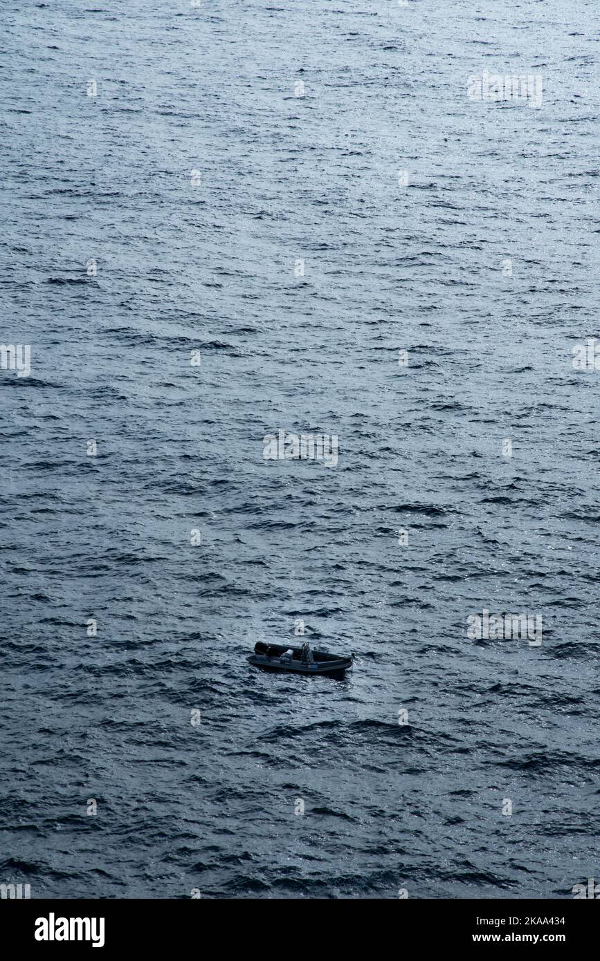 A vertical shot of the boat floating on the sea surface. Monte Carlo ...