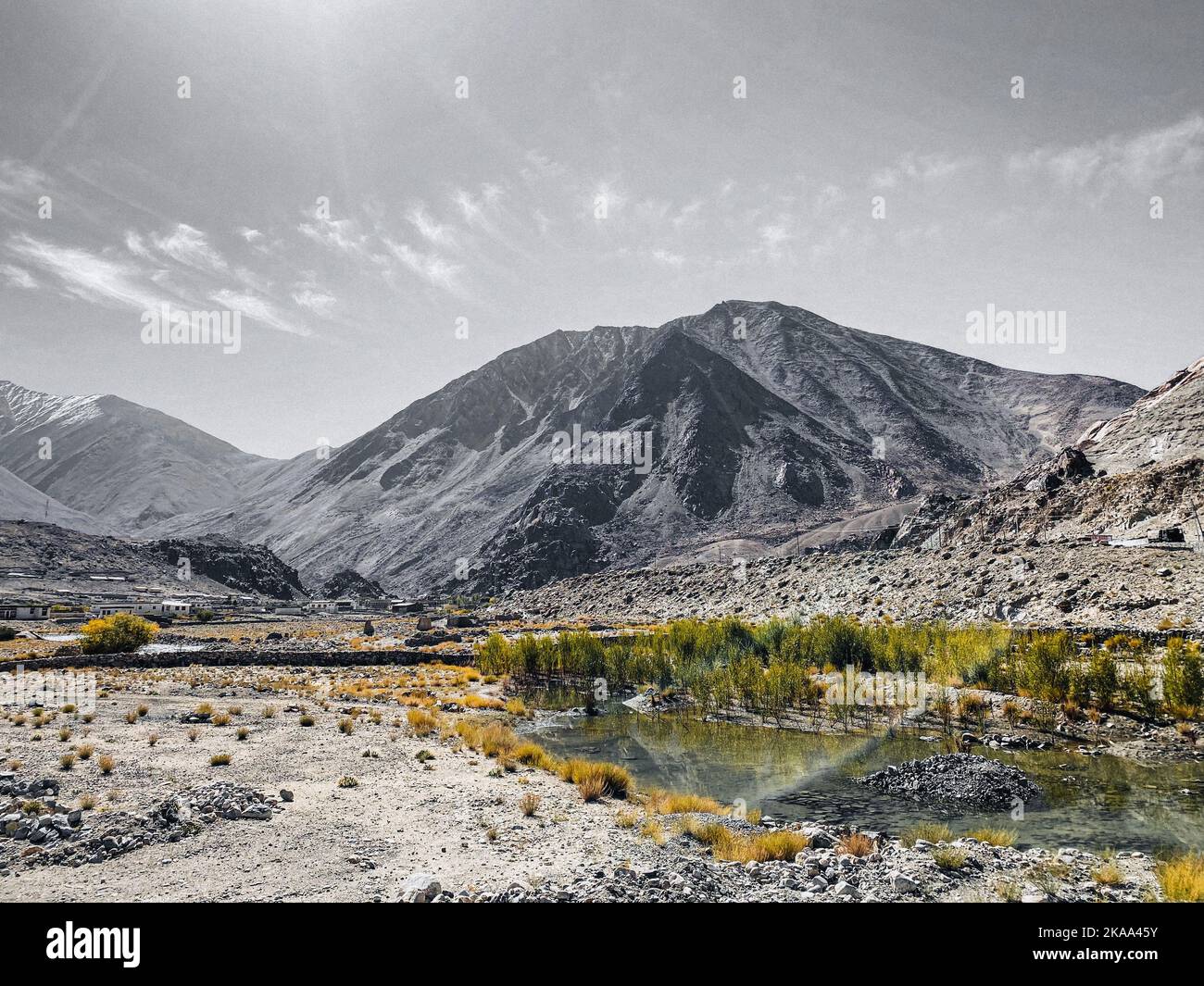 A low angle shot of a beautiful lake near the mountains Stock Photo - Alamy