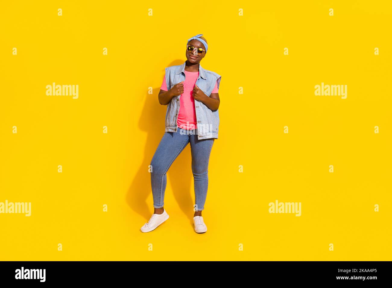 Full length photo of confident nice person hands touch denim vest ...