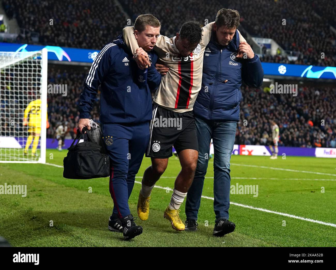 Ajax's Owen Wijndal receives treatment after colliding with the ...