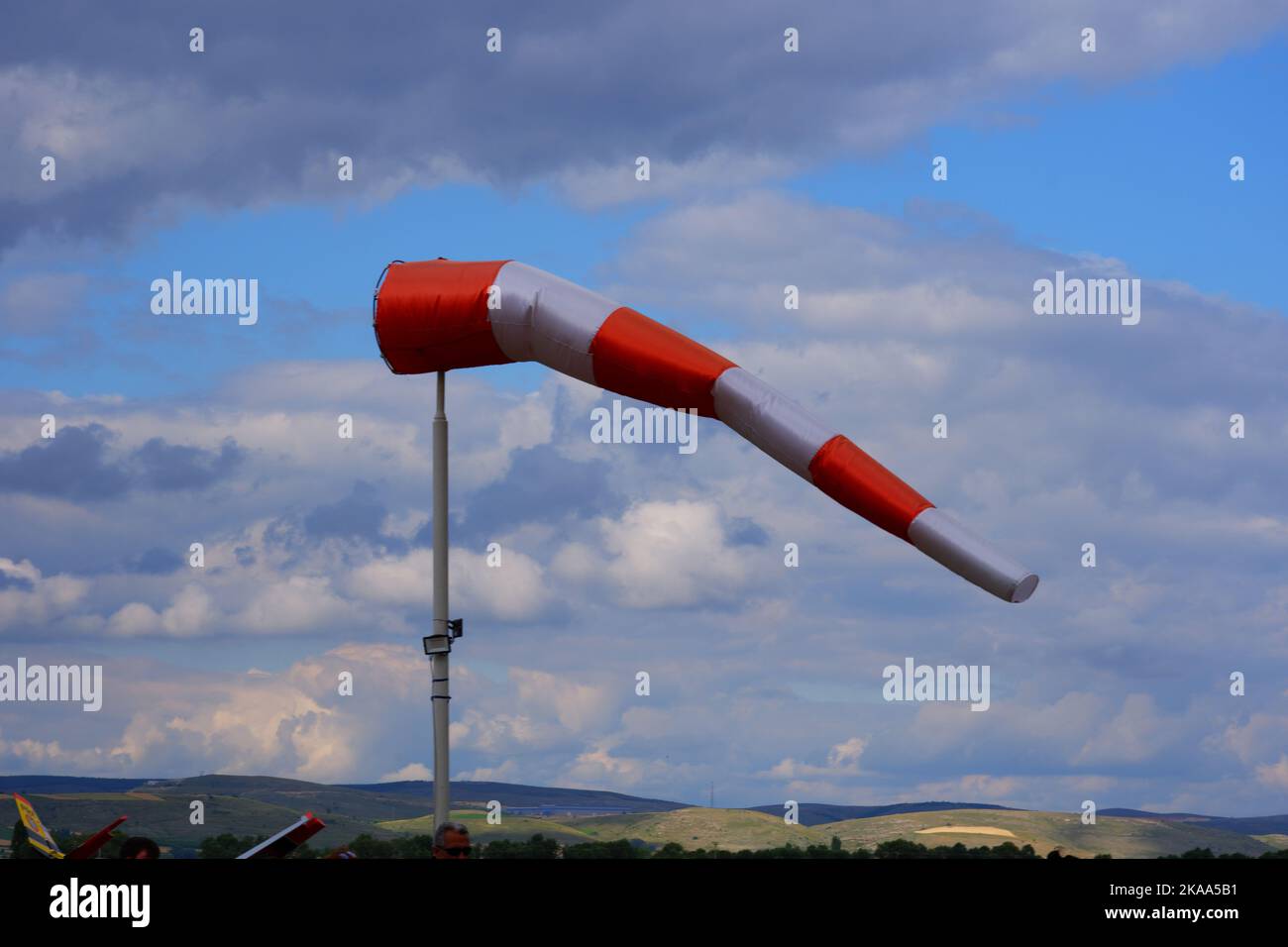 Windsock at cloudy sky Stock Photo - Alamy