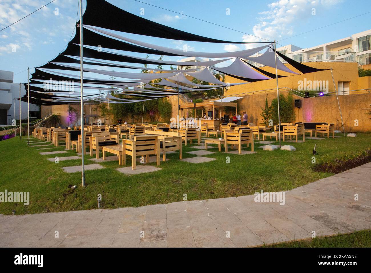hotel patio terrace with wooden furniture Stock Photo - Alamy