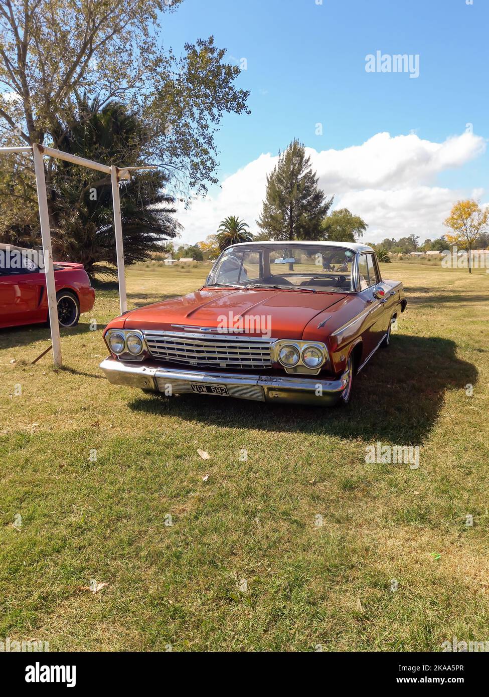 Old maroon Chevrolet Chevy Impala four door sedan 1960s by GM in the ...