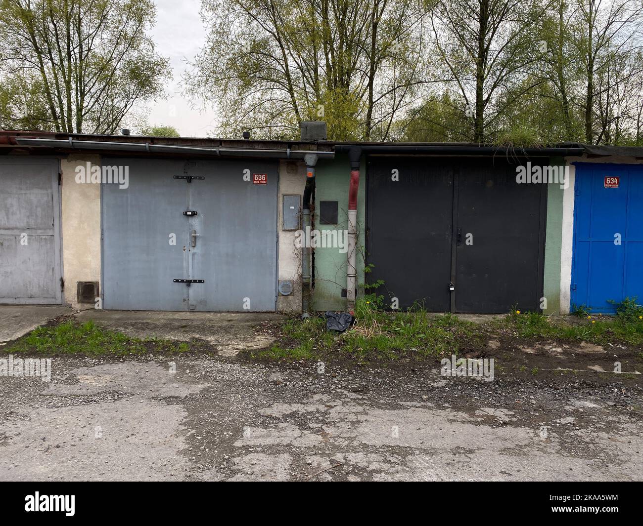 A view of old parking garages in street Stock Photo - Alamy