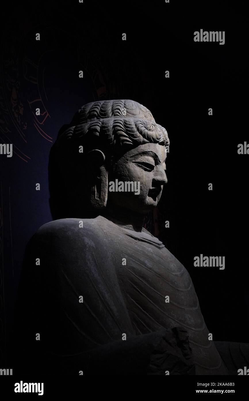The Yangzhou Buddha sculpture at the exhibition in the museum in a ...