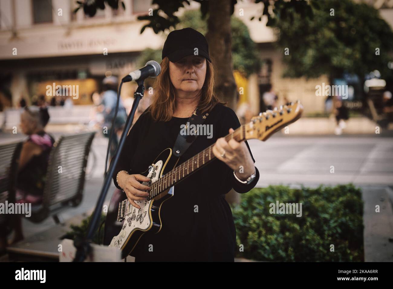 Female singing busker hi-res stock photography and images - Alamy