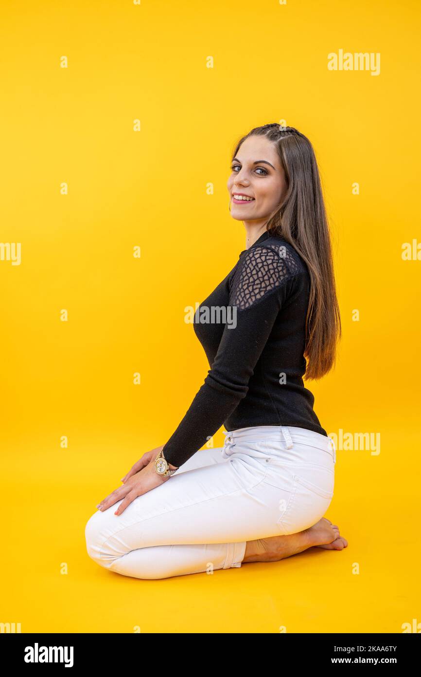 A beautiful caucasian female posing for a photo in a studio Stock Photo ...