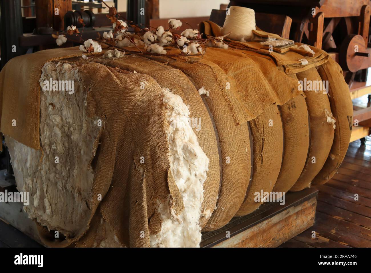 Inside the mills at Slatersville Museum, stand the bales of cotton in ...