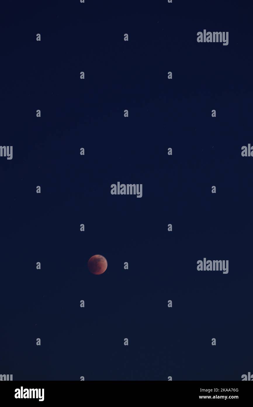 A mysterious view of a night sky with red moon in Los Angeles ...