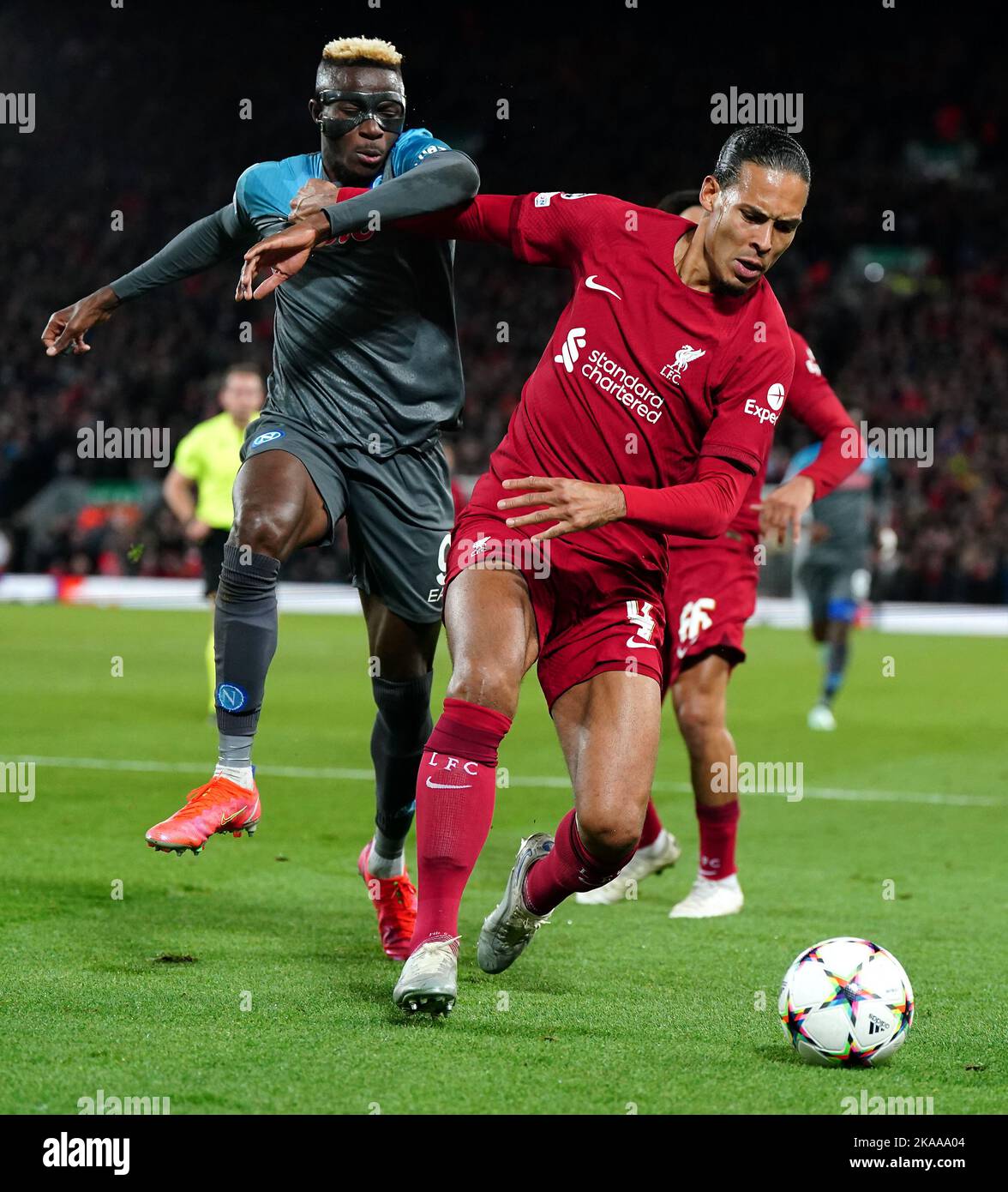 Napoli's Victor Osimhen is caught in the face by Liverpool's Virgil van ...