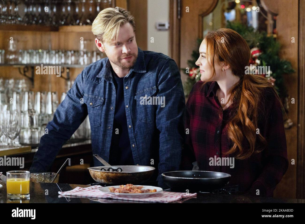 FALLING FOR CHRISTMAS, from left: Chord Overstreet, Lindsay Lohan, 2022. ph: Scott Everett White ...