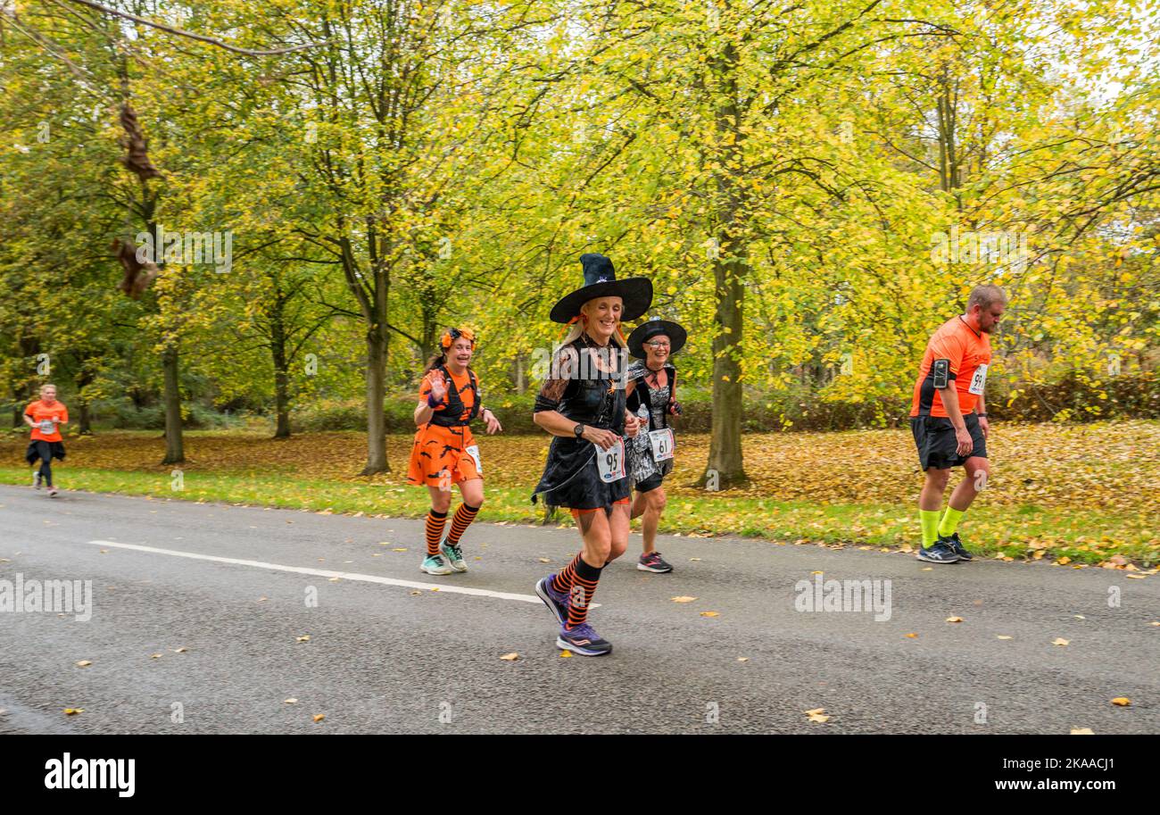 Female runner in a Witch fancy dress competing in the Worksop Halloween ...
