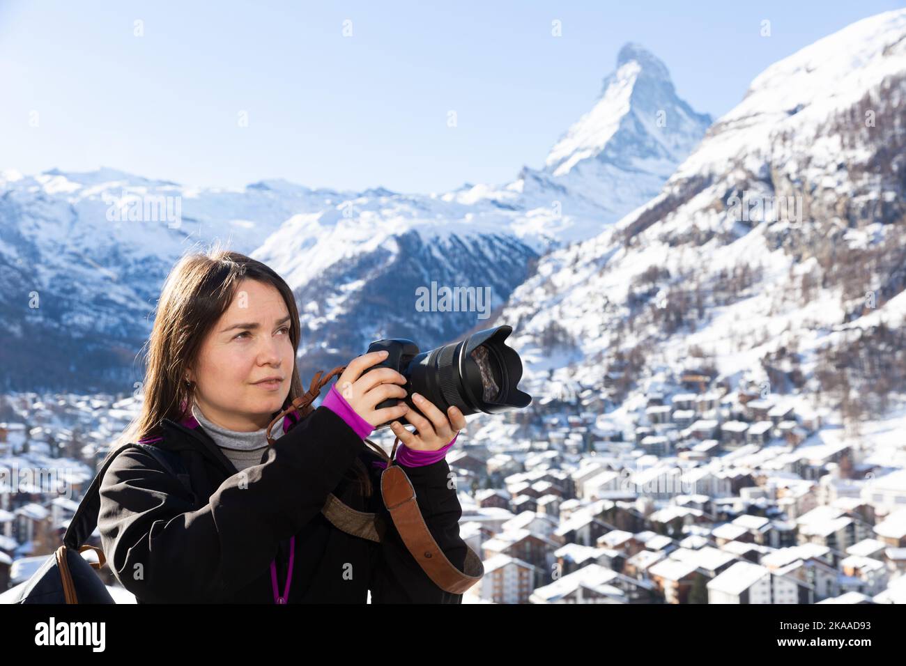 Female taking pictures alpine hi-res stock photography and images - Alamy