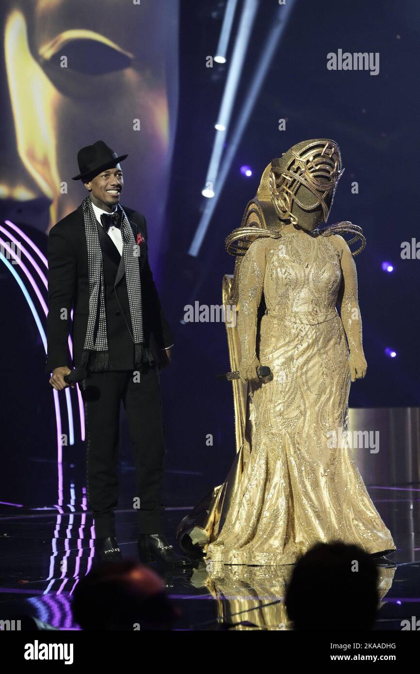 THE MASKED SINGER, from left: host Nick Cannon, Harp, 'A Royal Season ...