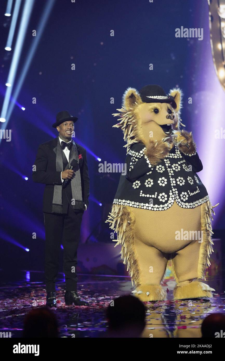 THE MASKED SINGER, from left: host Nick Cannon, Hedgehog, A Royal ...