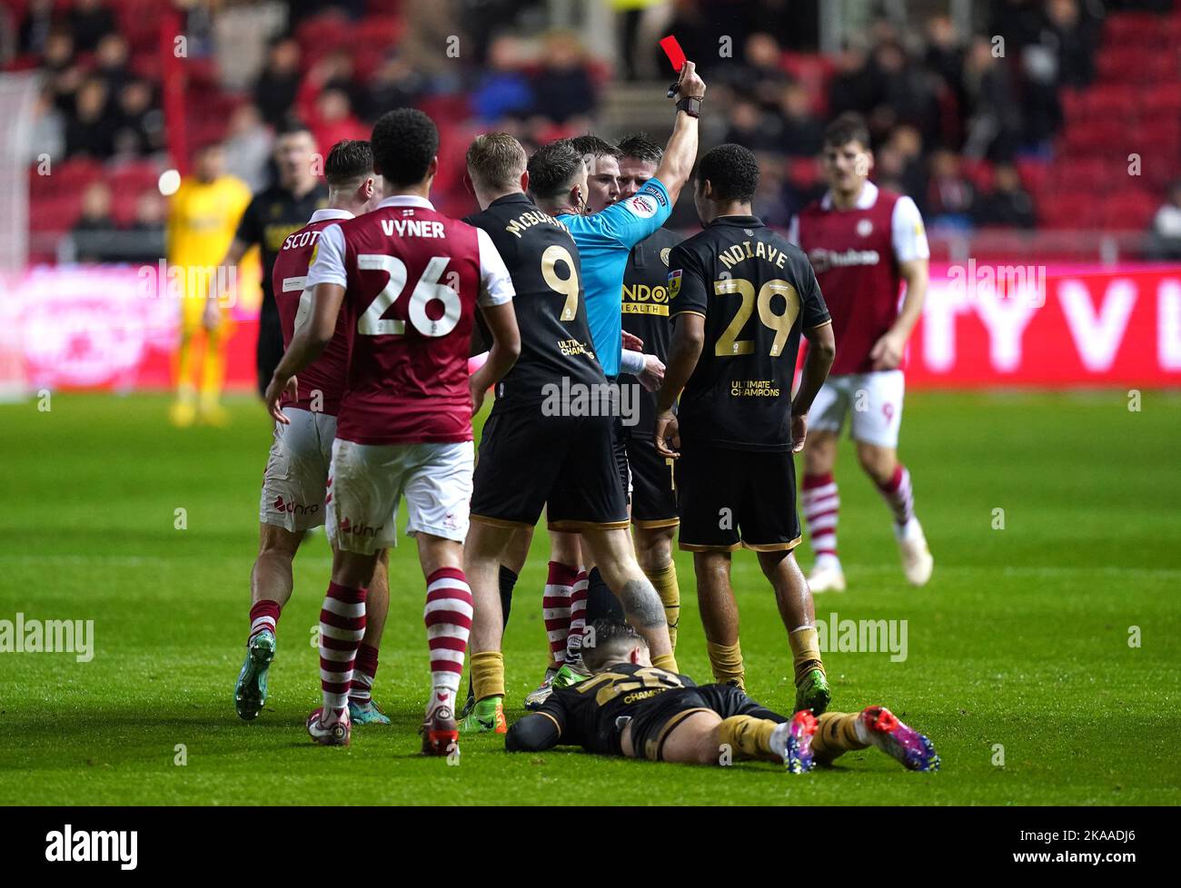 Bristol City's George Tanner is shown a red card by referee George ...
