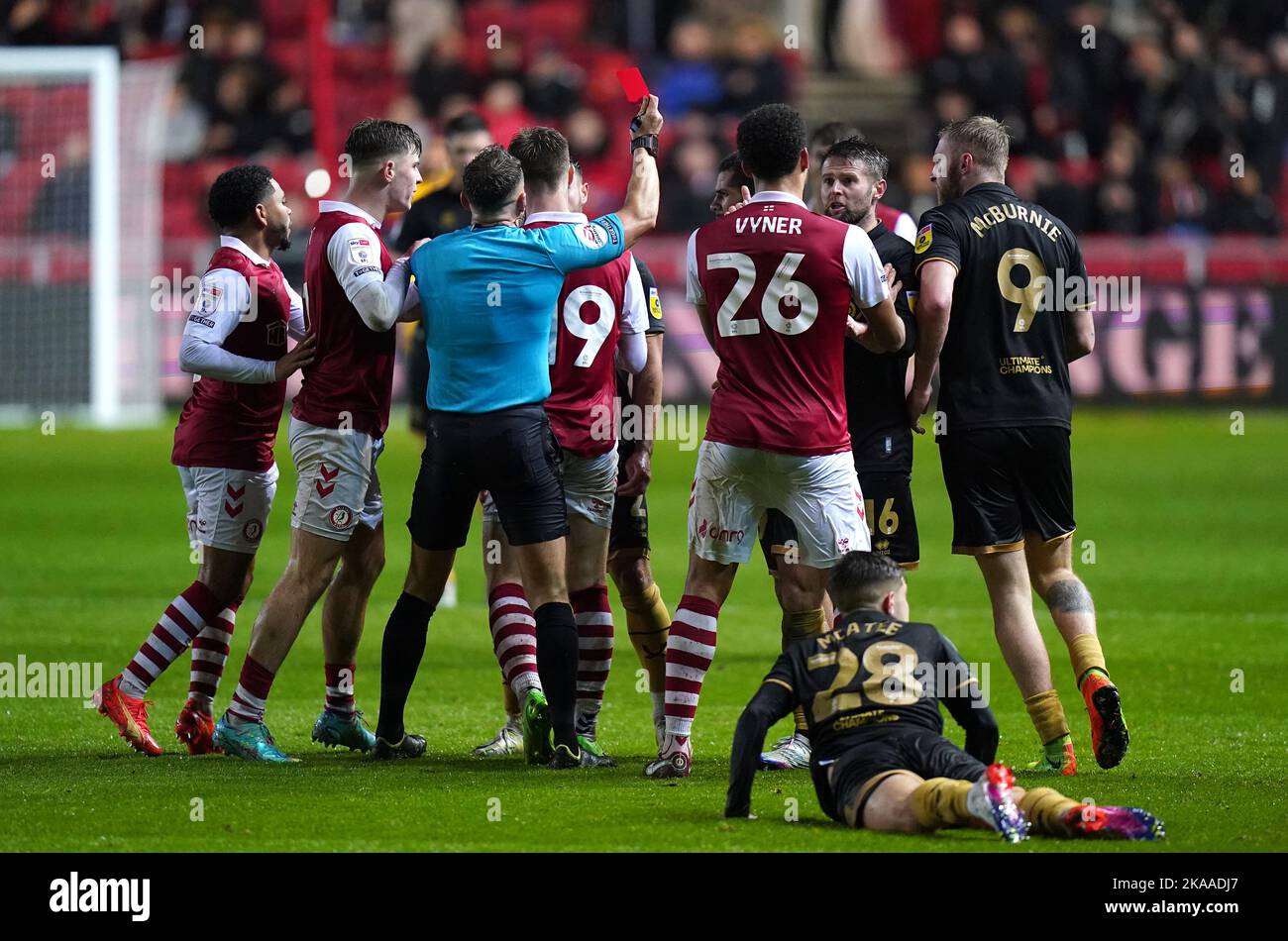 Bristol City's George Tanner is shown a red card by referee George ...