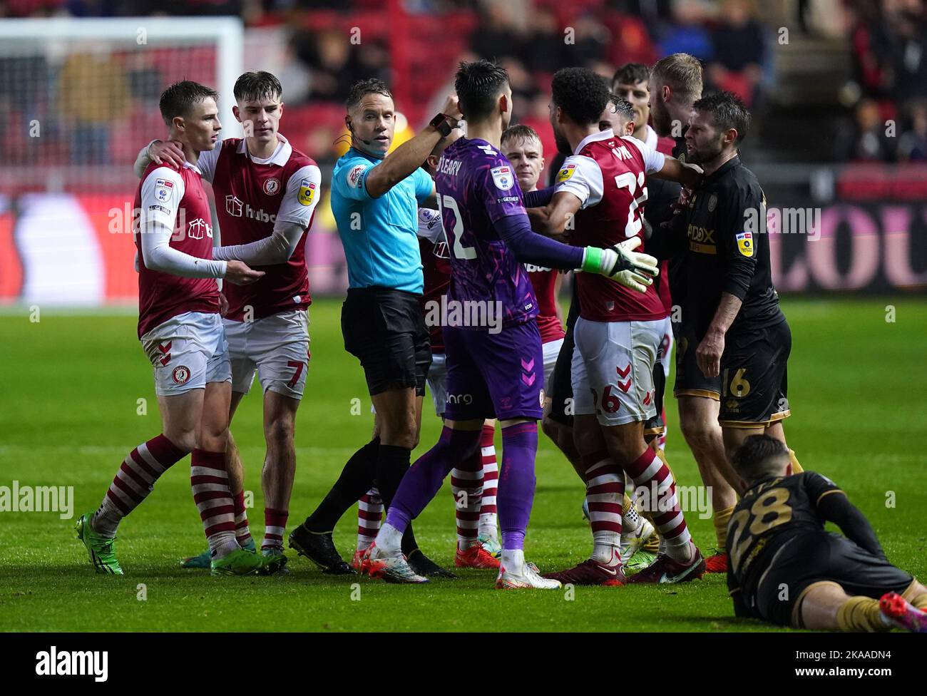 Tempers flare after Bristol City's George Tanner is shown a red card by referee George Tanner ...