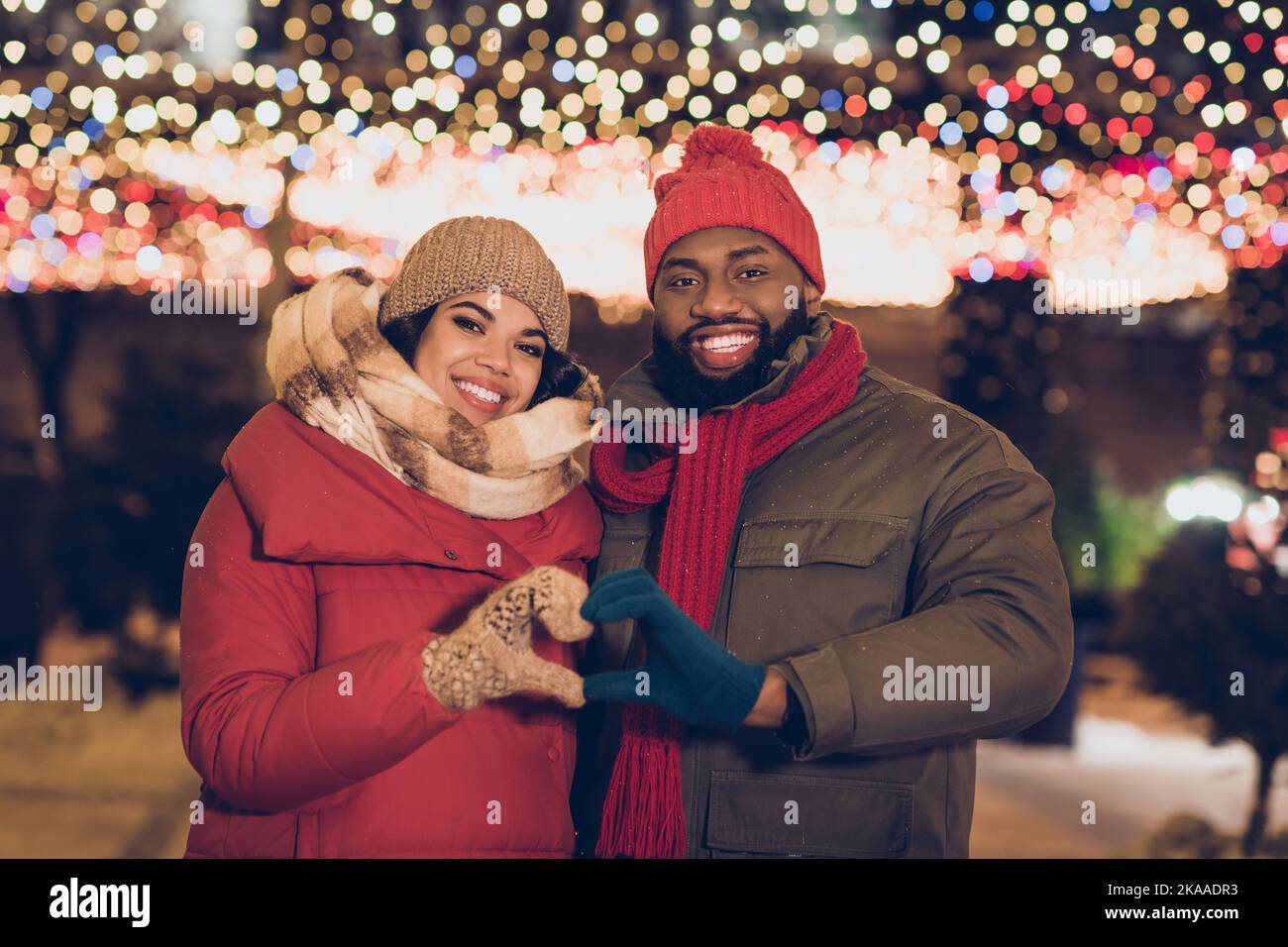 Photo of cute funny husband wife wear winter season clothes showing ...