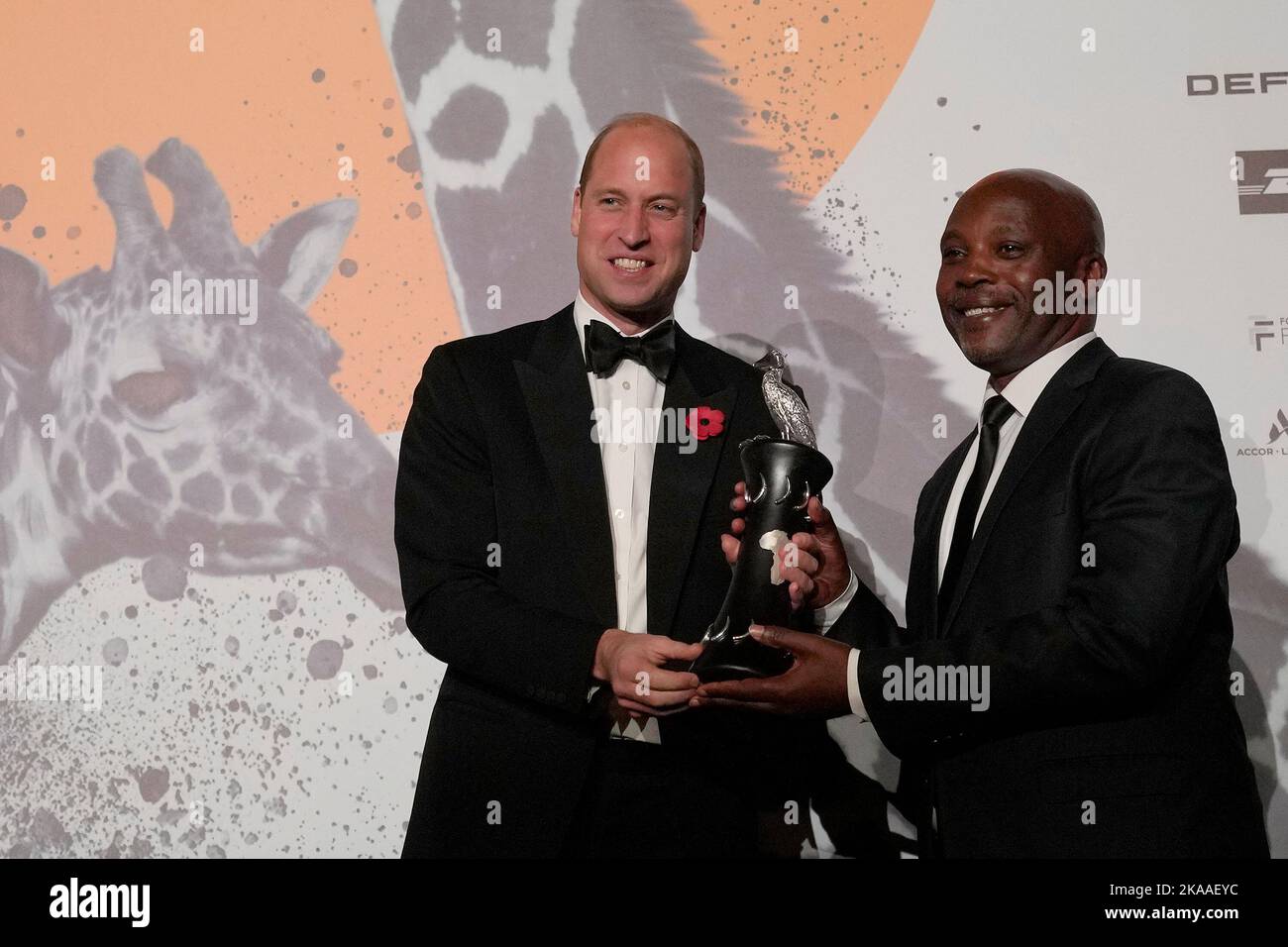 The Prince of Wales awards Achilles Brunnel Byaruhanga of Uganda with ...