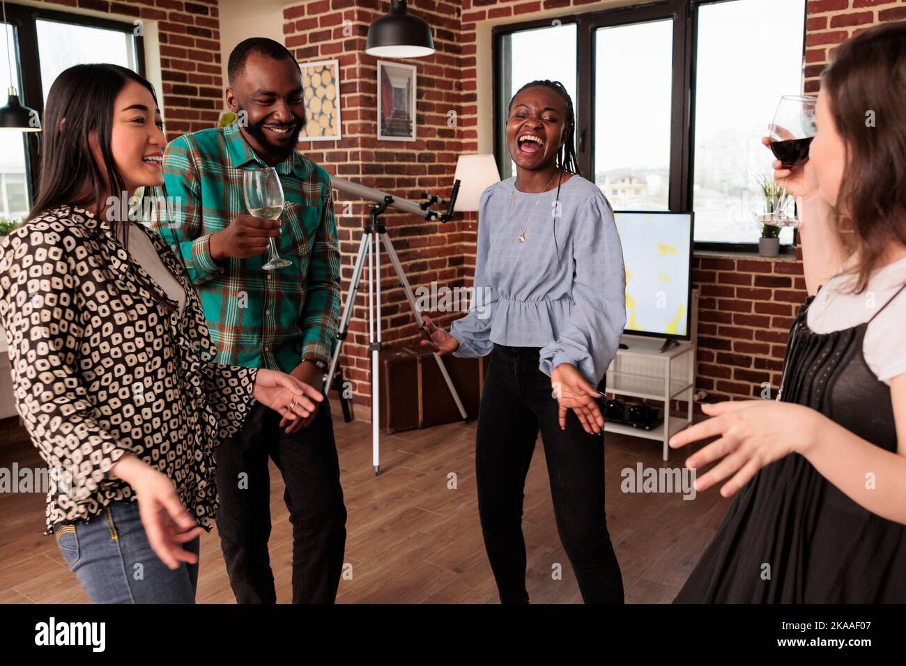 People multiethnic group having good time, smiling, laughing, guffawing ...