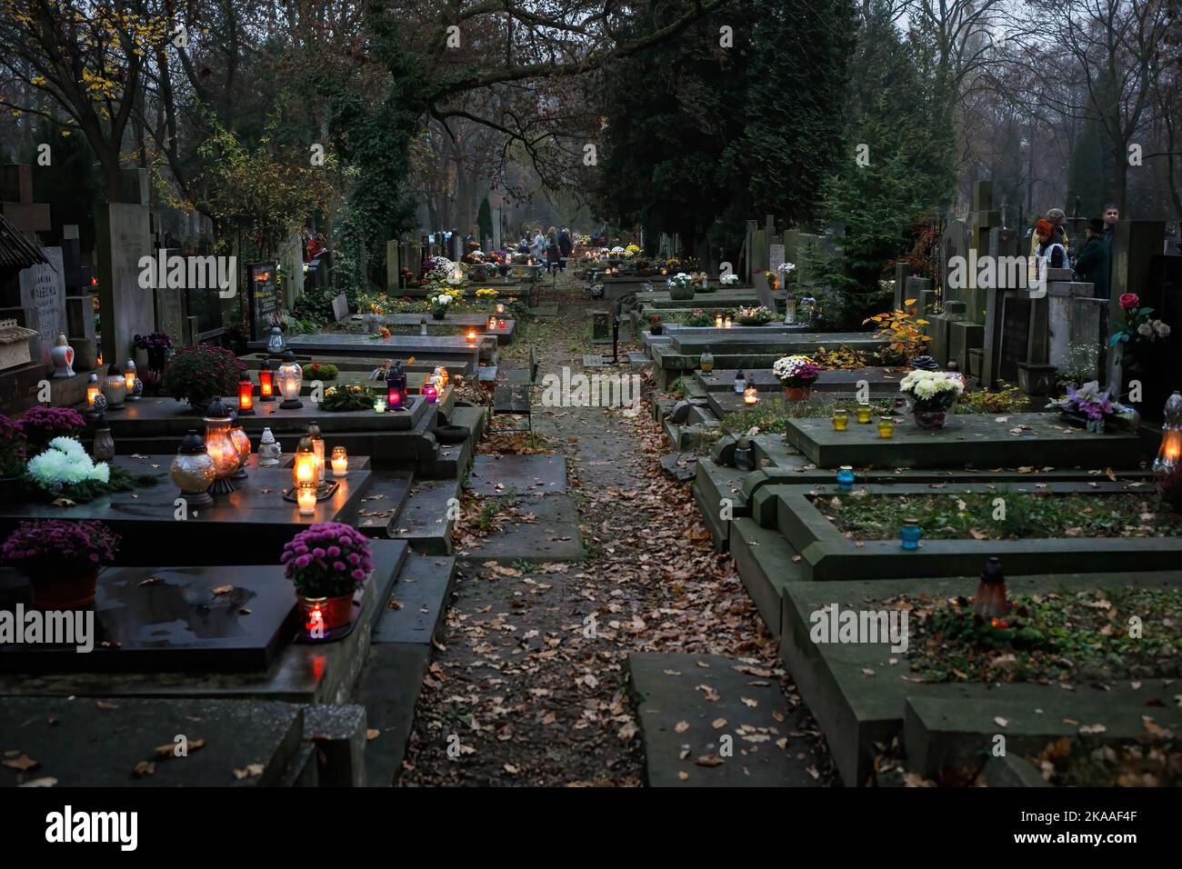 Warsaw, Poland. 01st Nov, 2022. Lit candles cover tombs on All Saints ...
