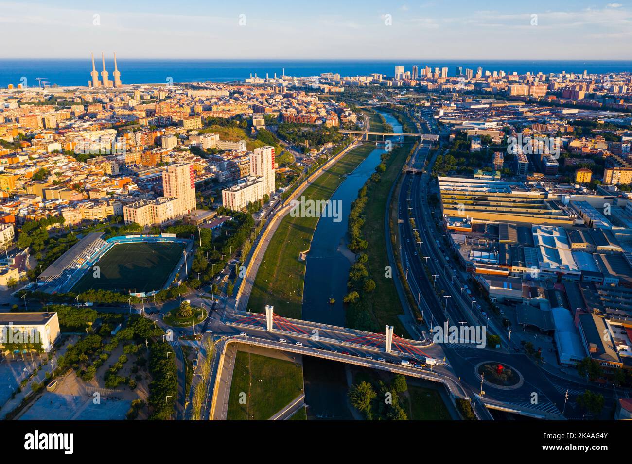 Aerial view of Besos river with Barcelona and Sant Adria on its banks ...