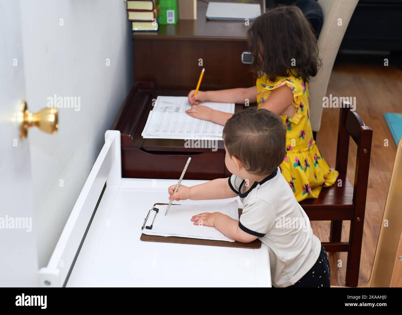 Toddler writing girl hi-res stock photography and images - Alamy