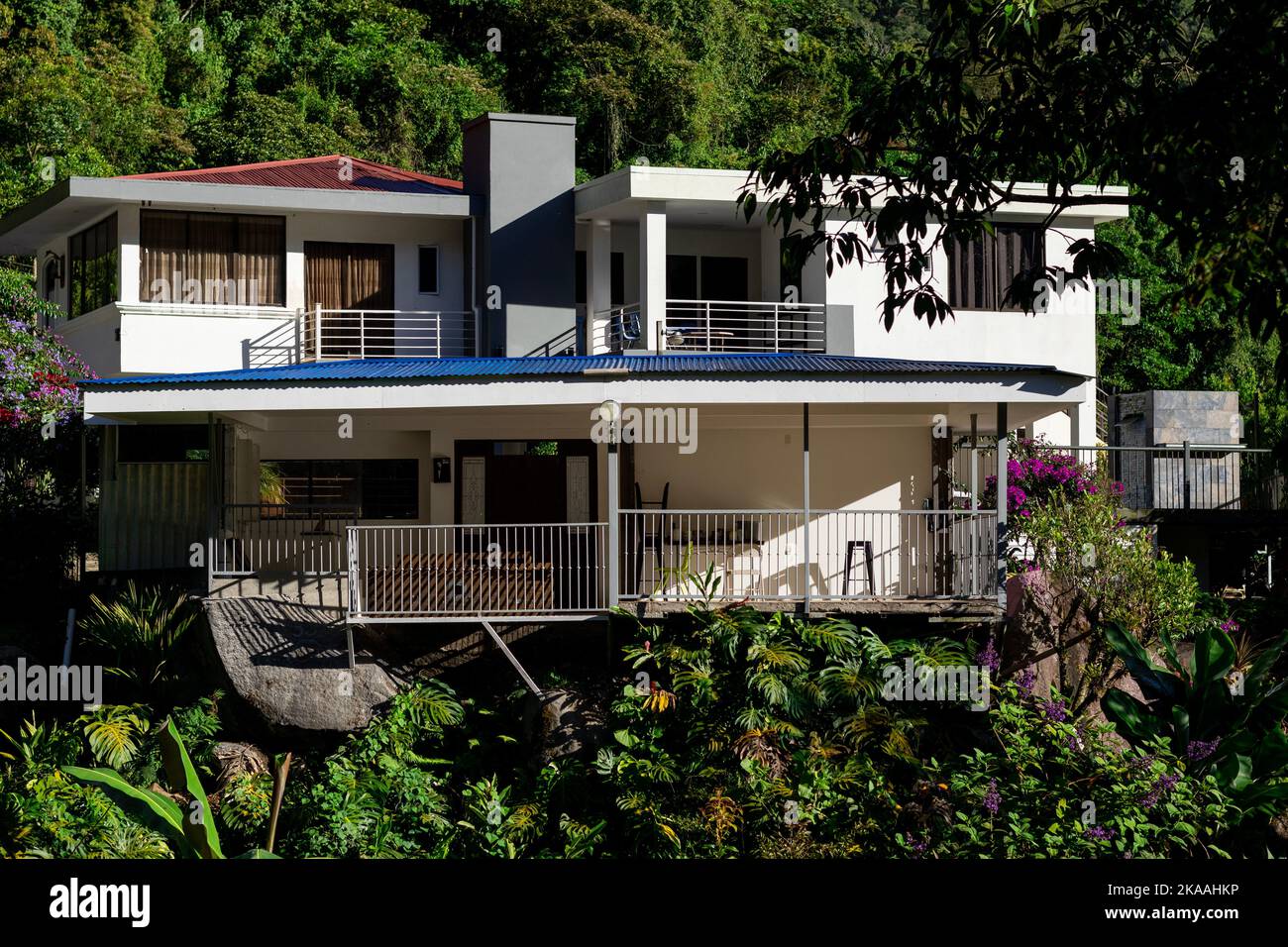 Beautiful and fine house in the forest Stock Photo - Alamy