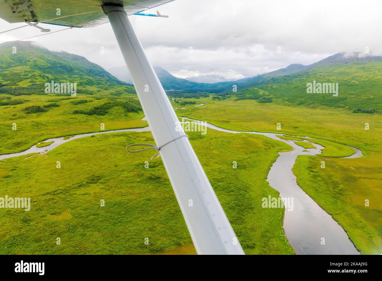 Aerial view of remote river; Kodiak Island; de Havilland; Beaver; float ...